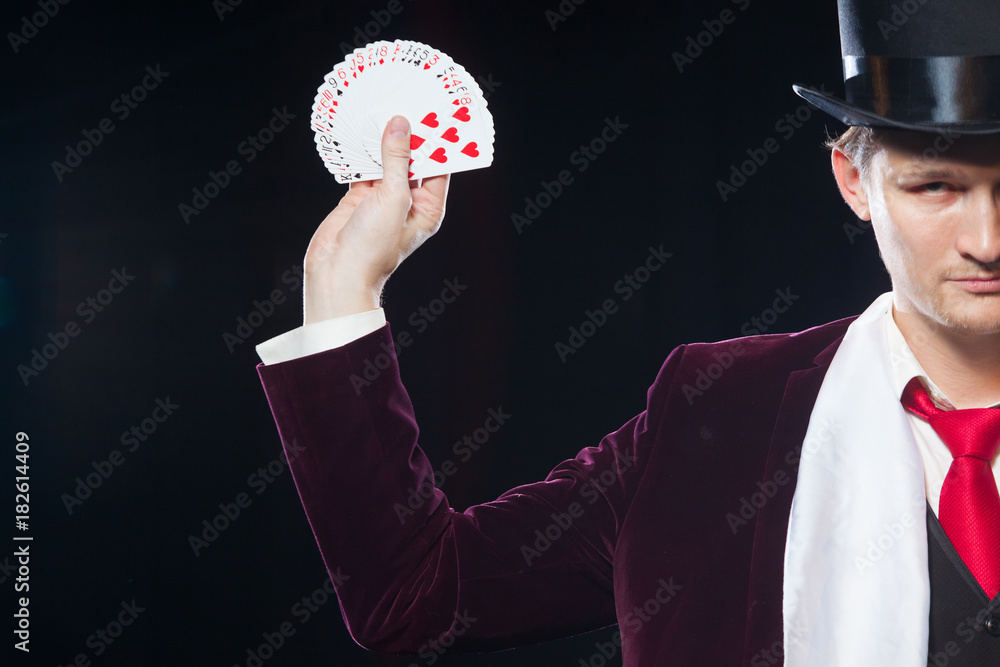 Hand with cards close-up. Midsection of magician showing fanned out ...