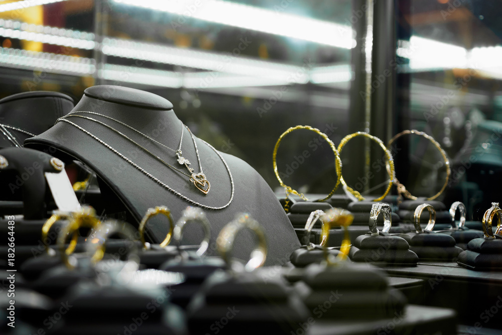 Gold jewelry diamond shop with rings and heart shape necklaces in ...