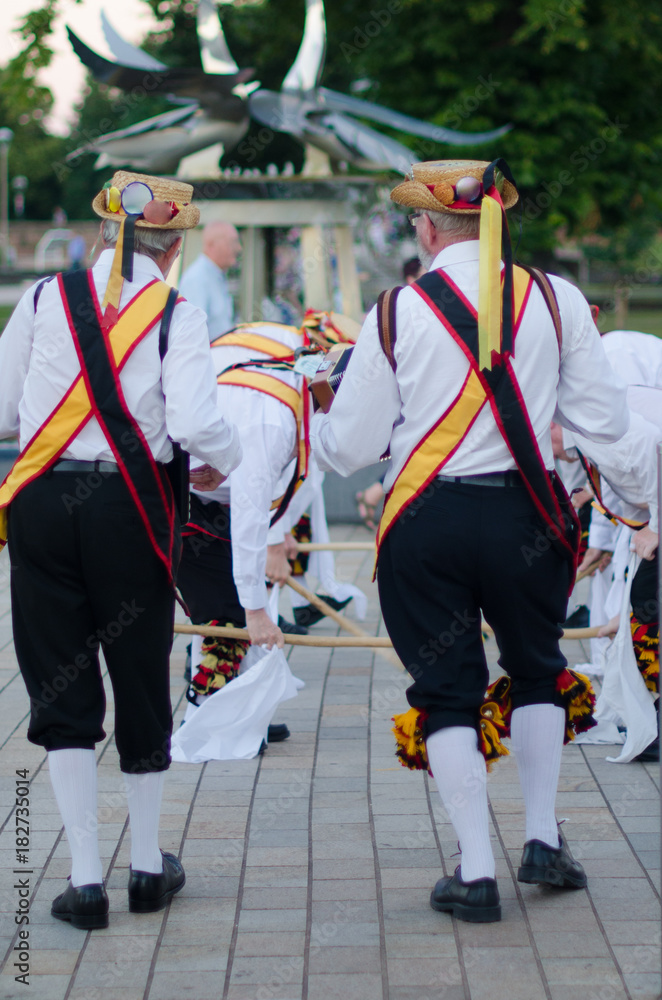 Poster Traditional morris men dancing in the UK with sticks bells and ...