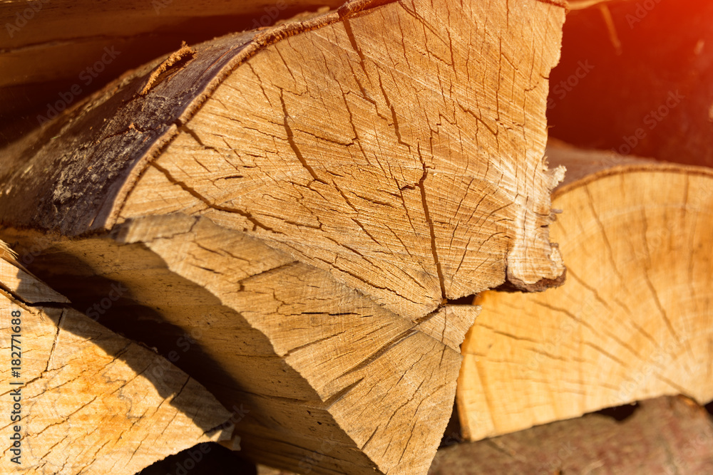 chopped log logs stacked in a drow log close-up as a background or ...