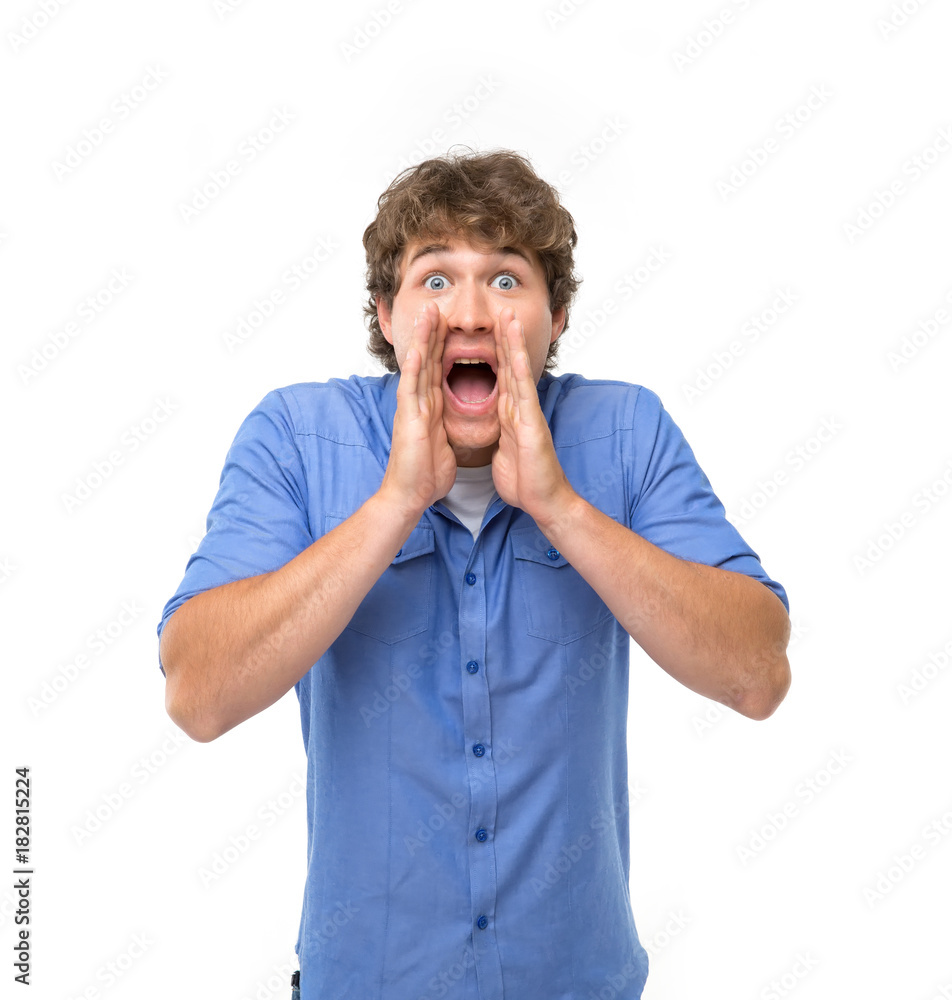 Gesture - yelling, shouting loudly. Emotional man in blue shirt on ...