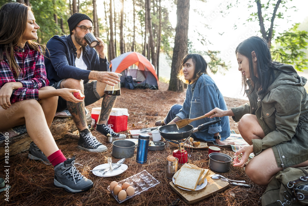 Campers making breakfast at the campsite Stock Photo | Adobe Stock