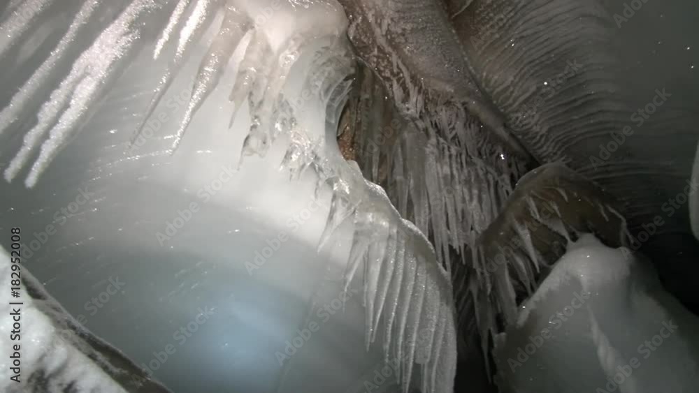 Icicles in cave Svalbard Arctic. Hollow place in in glacier. Eternal ...