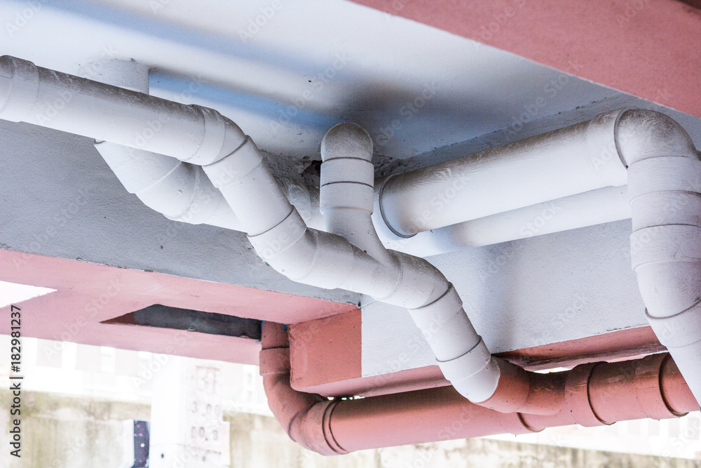 Water pipe system setup on structure of the building. Stock Photo ...