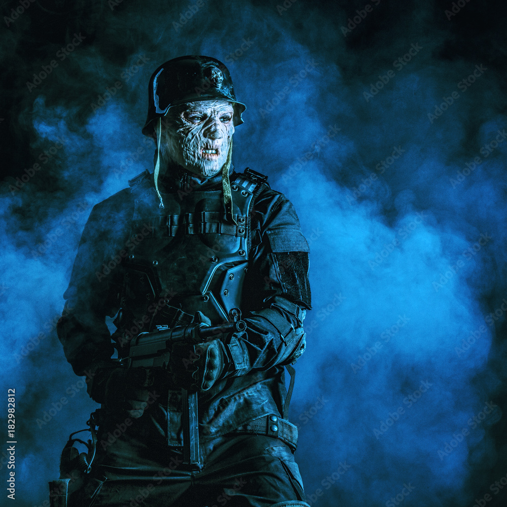 Ugly face of Futuristic nazi soldier in gas mask and steel helmet. Skin ...