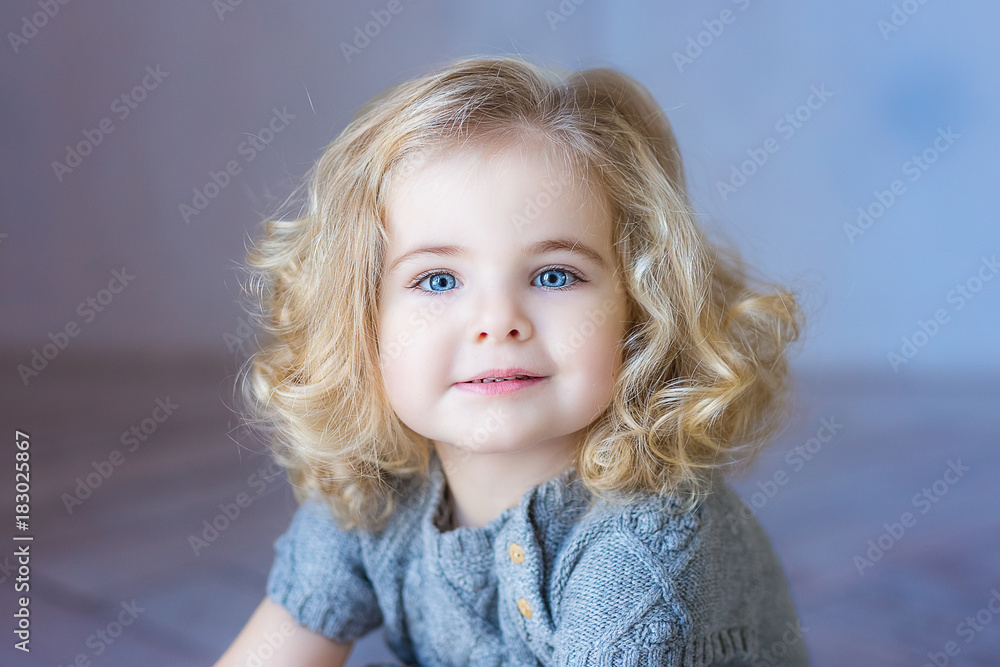 Beautiful toddler girl smiling. Сlose-up portrait. Blue eyes. Stock ...
