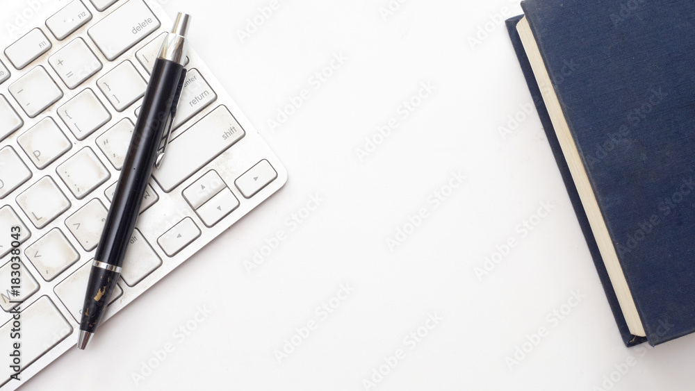 workspace desk with keyboard and booknote on white background Stock ...