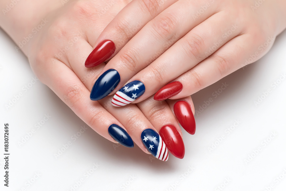 Red blue nails with a design American flag on long sharp nails Stock ...