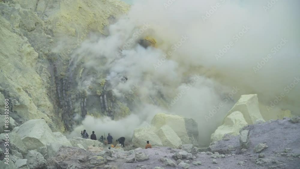 Extraction of sulfur in the crater of a volcano. Sulfur, sulfur gas ...