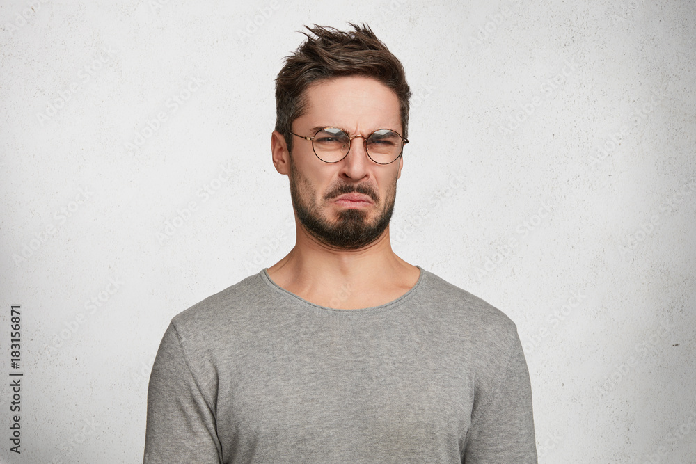 Negative human expressions and attitude. Angry dissatisfied male has ...