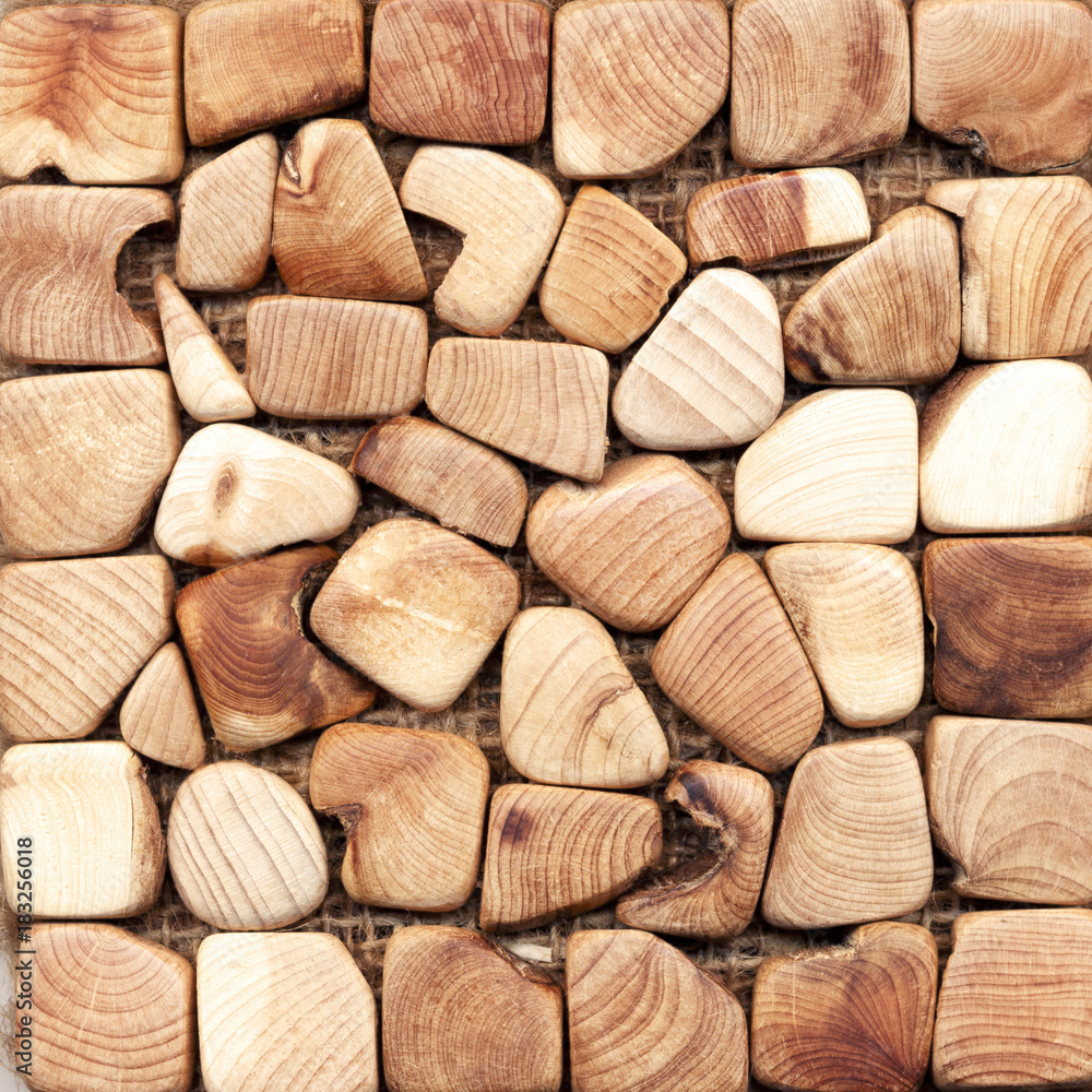 Small polished wooden pieces texture background. Natural crosscut ...