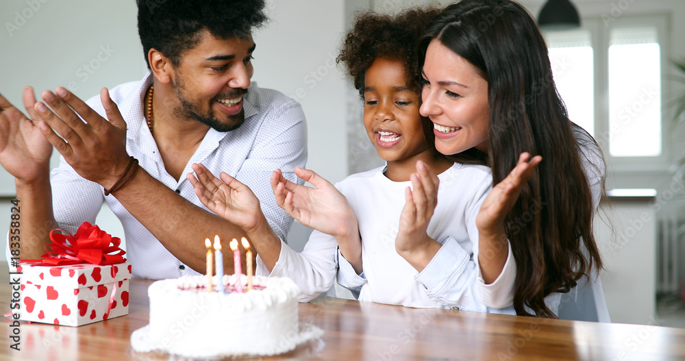 Young happy family celebrating the birthday in a living room Stock ...
