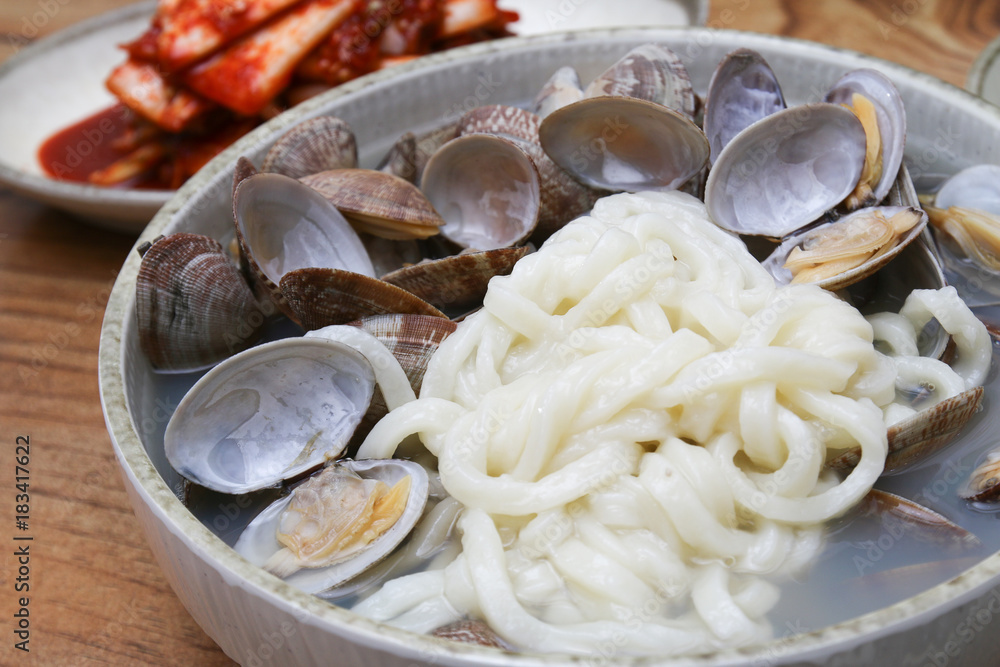 Bajirak Kalguksu, Korean knife cut noodle soup with clams Stock Photo ...