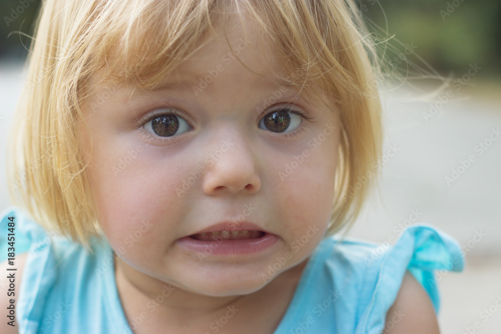 Adorable little girl making disgusted or surprised face Stock Photo ...