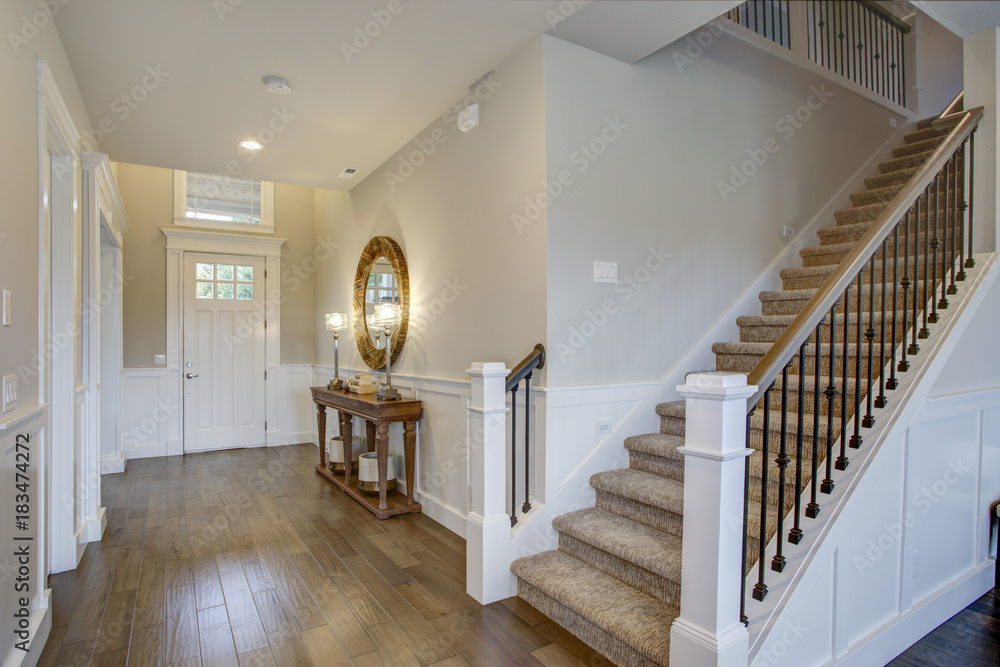 Fabulous foyer features a staircase Stock Photo | Adobe Stock