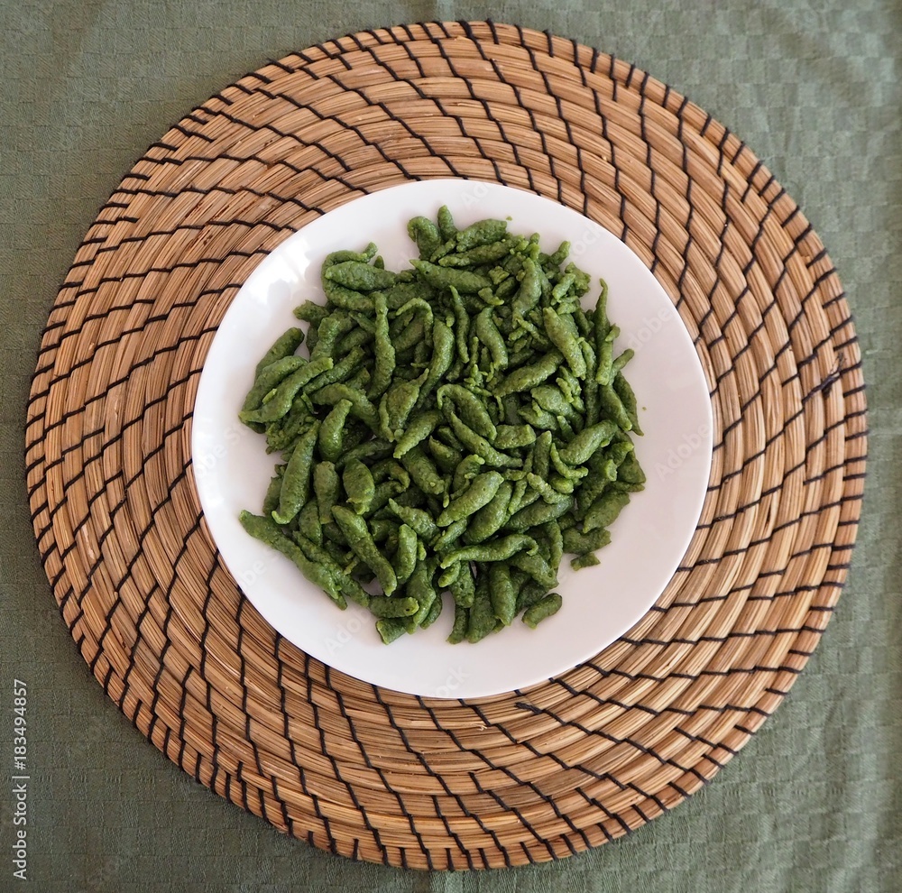 Spatzle with spinach ready to be cooked. Spatzle, or spaetzle, is a ...