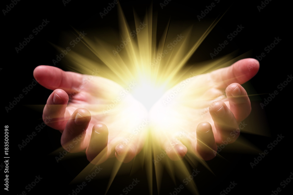 Woman hands cupped holding, showing, or emanating bright, glowing ...