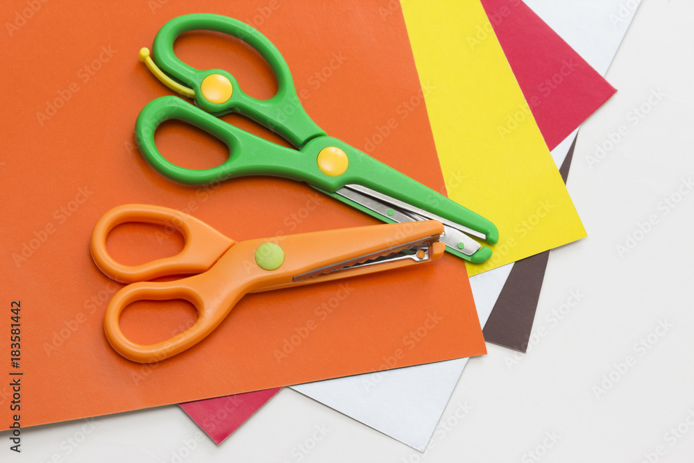 Safe scissors and colored paper Stock Photo | Adobe Stock