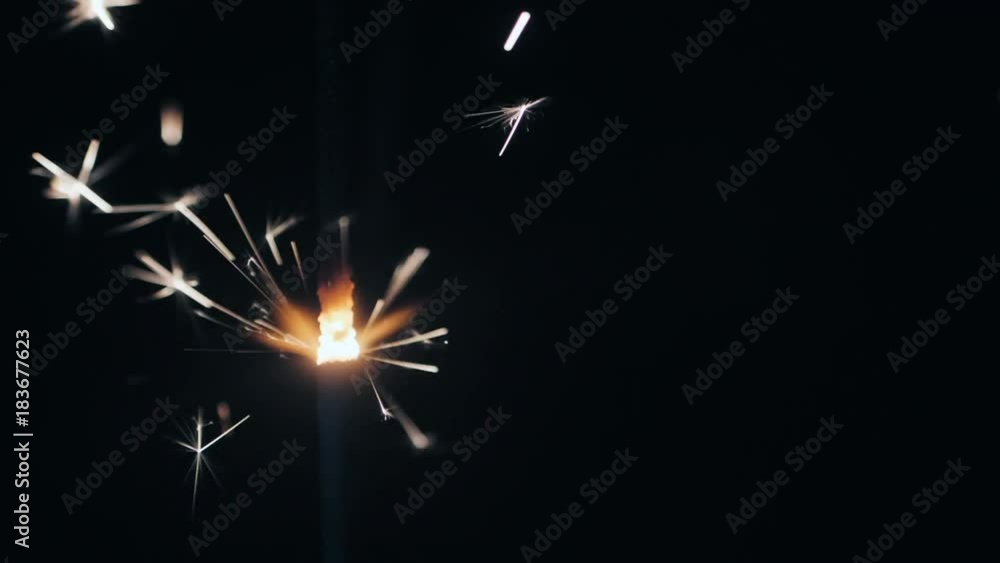 Sparkler Over Black. Gun powder sparks shot against deep dark ...