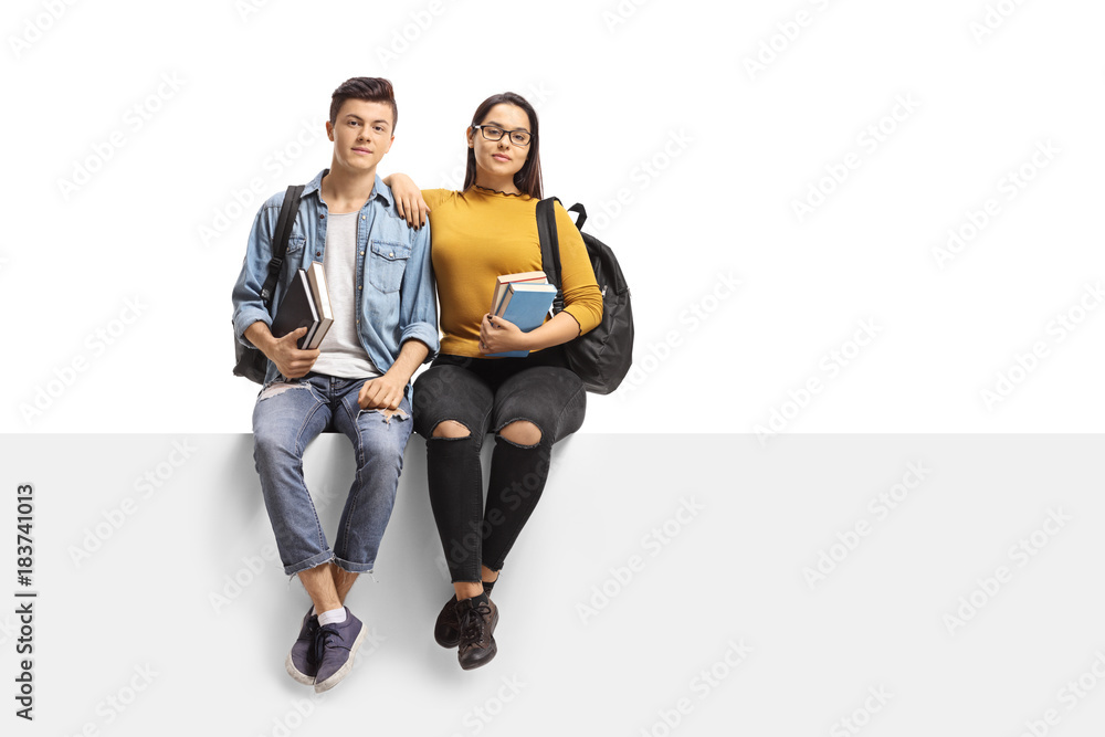 Teenage students sitting on a panel Stock Photo | Adobe Stock