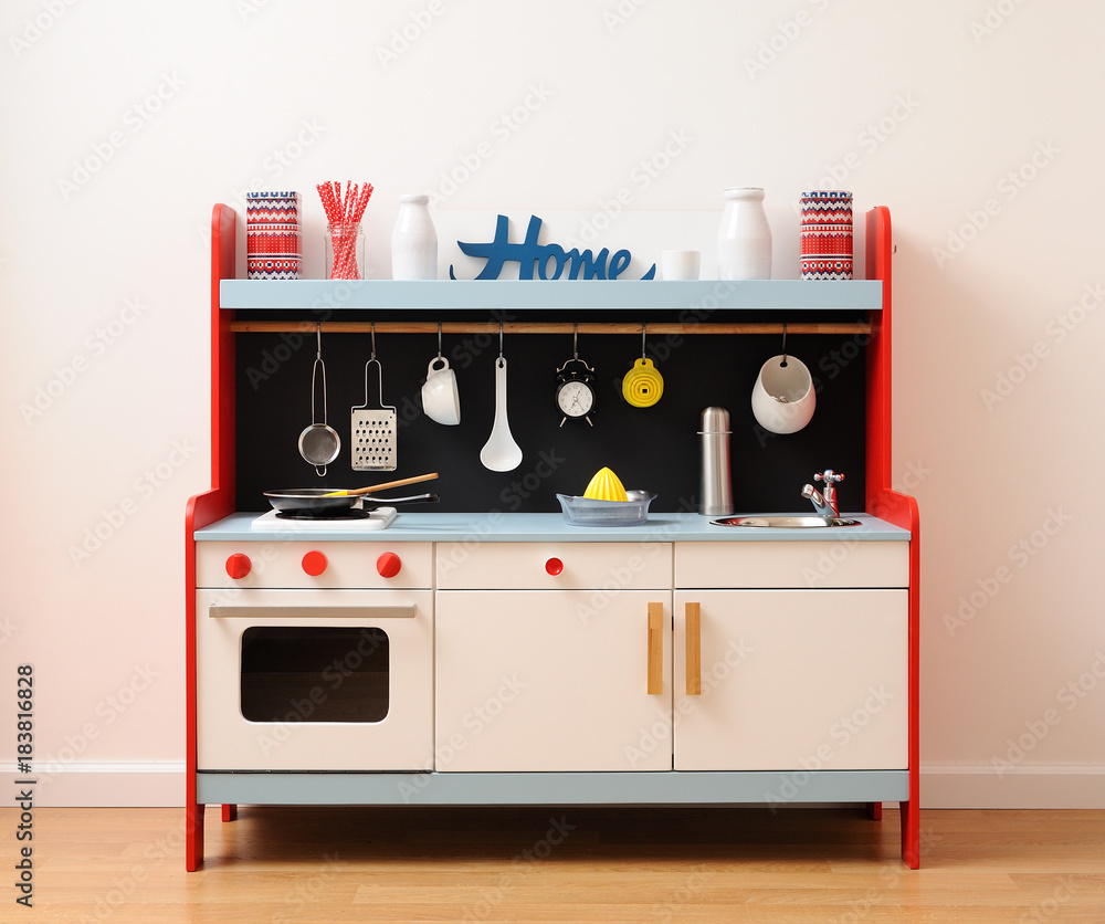 Designer toy kitchen in white, red and blue with drawers, oven, stove ...