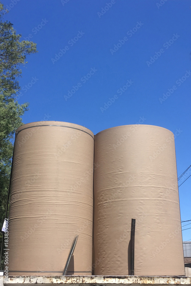 Truck transporting industrial roll of paper Stock Photo | Adobe Stock