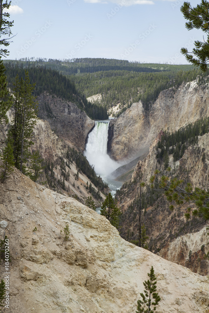 Grand Canyon of the Yellowstone River with steep rock walls and a ...