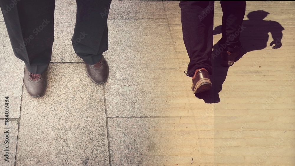 Concepts of continue or quit; stay or walk away; stop or go. Man is ...