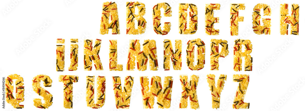 Pile of spaghetti forming a letters, all different shapes, colors and ...