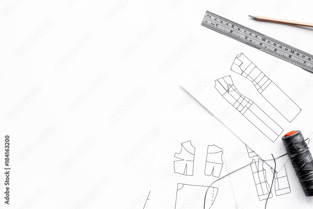 Tailor's work desk. Pattern of clothing and tools on white background ...