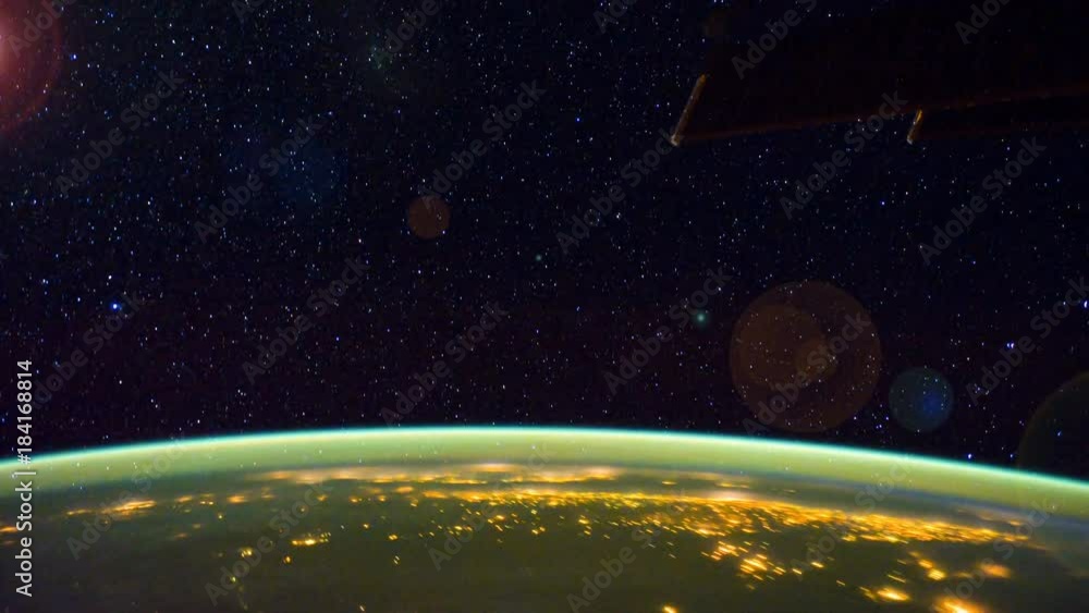 Rotating Planet Earth with aurora and star, as seen from the ...