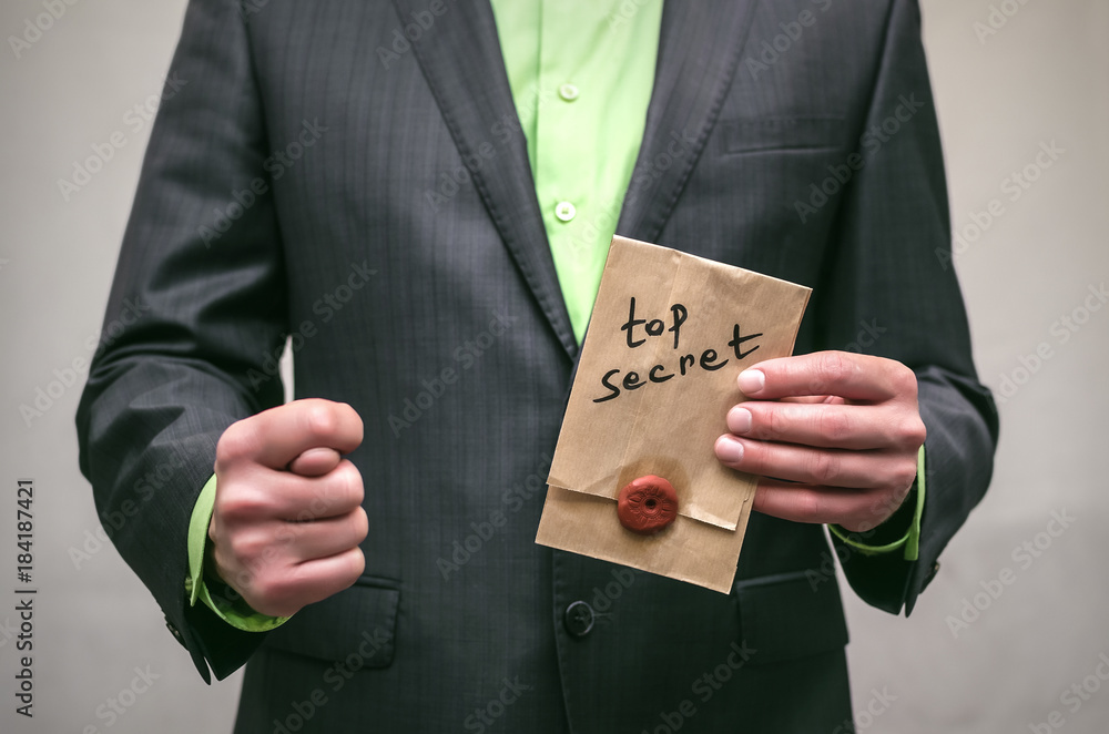 The spy. Secret service. Secret detecive agent holds secret documents ...