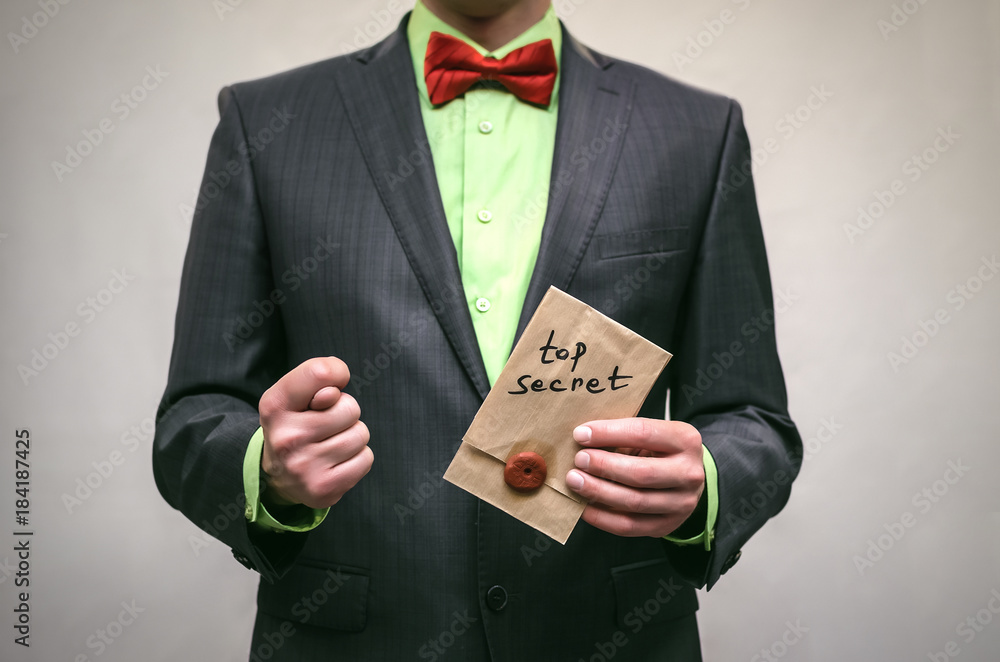 The spy. Secret service. Secret detecive agent holds secret documents ...