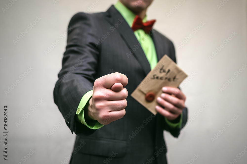 The spy. Secret service. Secret detecive agent holds secret documents ...