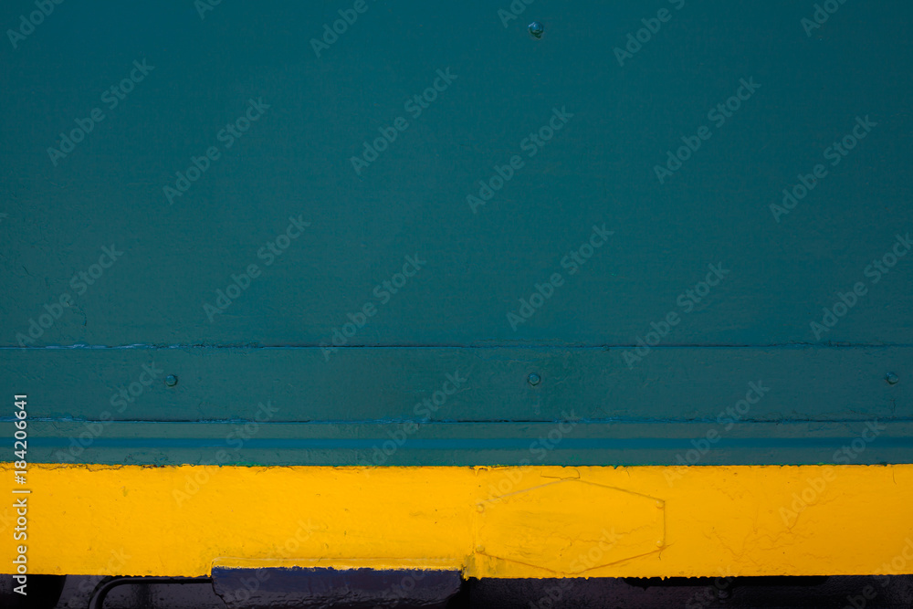 Paint smudges on the surface. The green background. Yellow lines on a ...