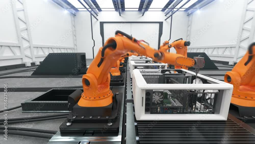 Robotic Arms Assembling Computers On Conveyor Belt. Modern Advanced ...
