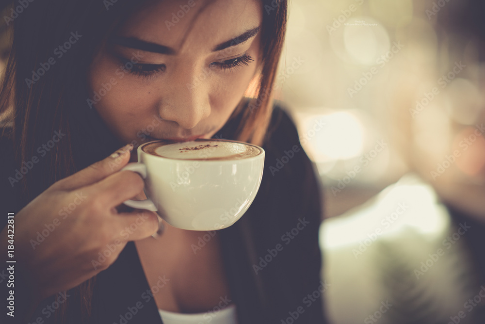 Woman Drinking Coffee Outside
