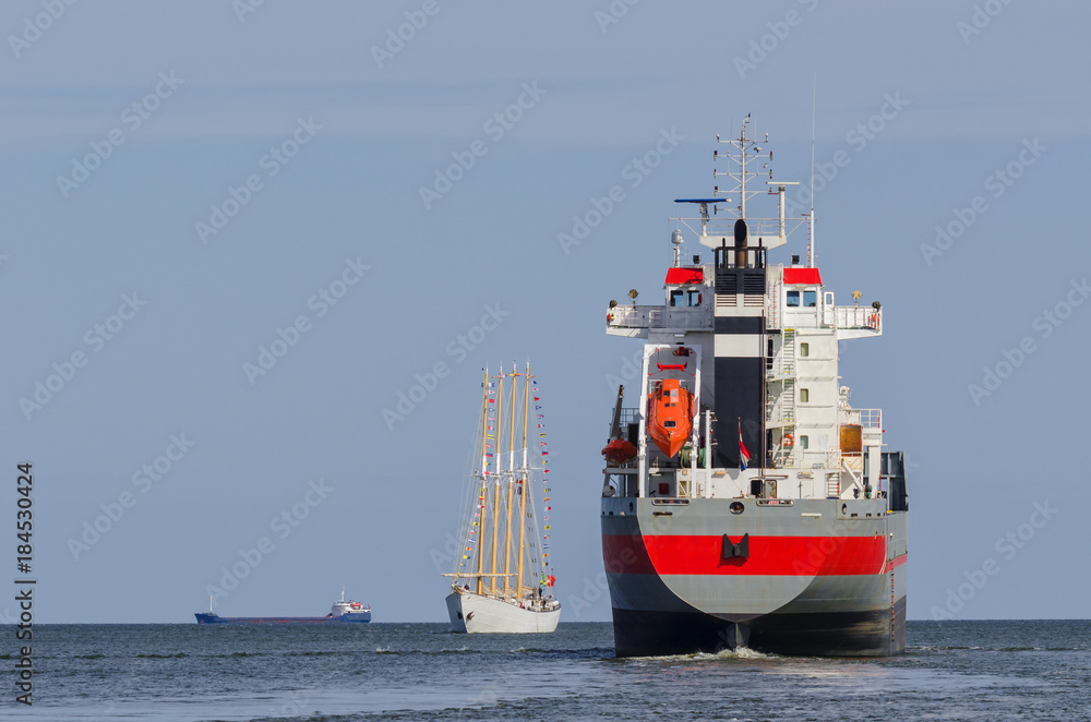SAILING VESSEL AND FREIGHTERS - Ships in the cruise on the sea Stock ...