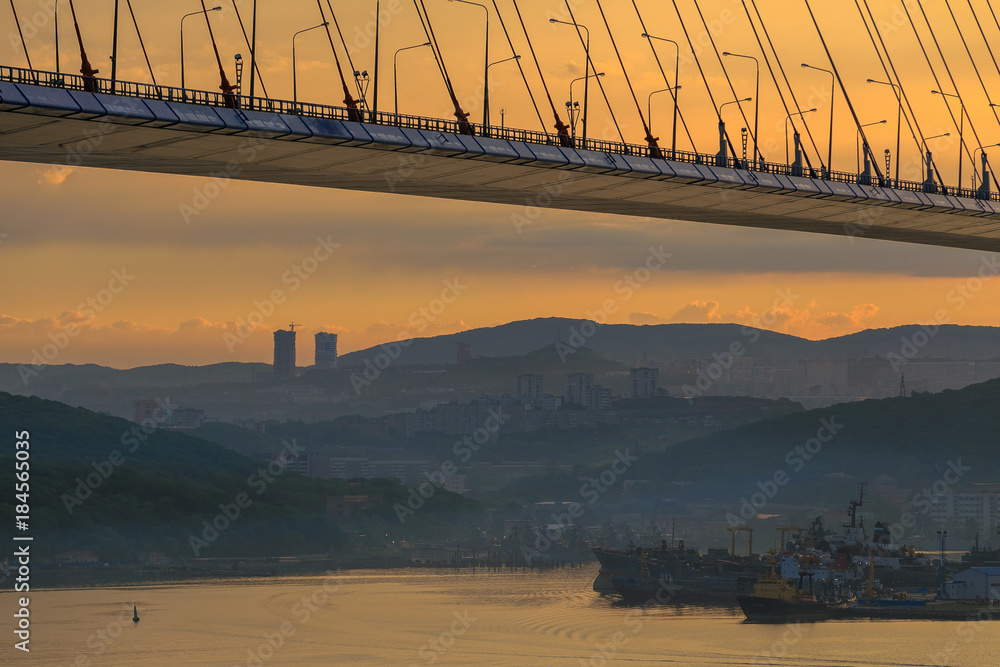 Amazing zooming out aerial view of the Russky Bridge, the world's ...