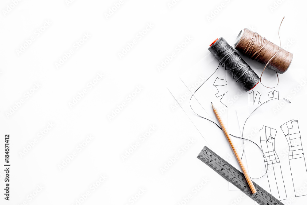 Tailor's work desk. Pattern of clothing and tools on white background ...