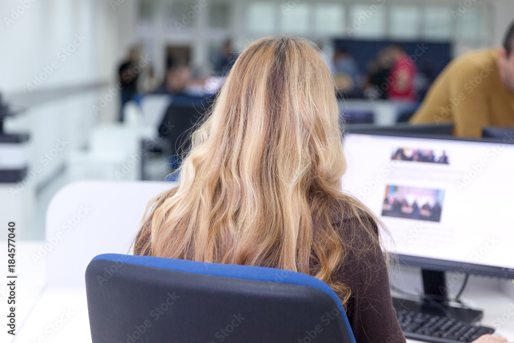 Female computer data entry operator Stock Photo | Adobe Stock