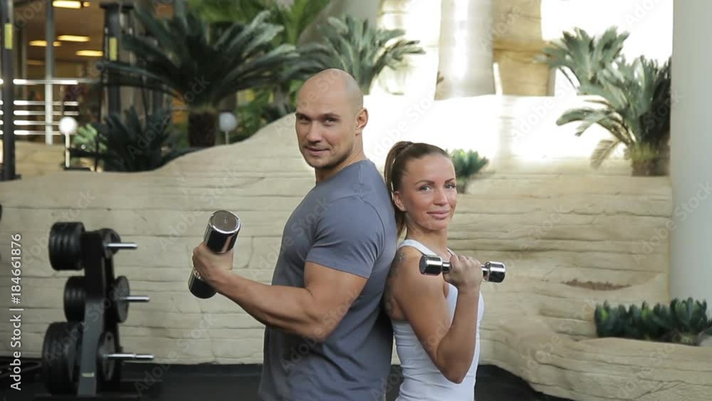 The pair of bodybuilders pose for the advertising photo in the luxury ...