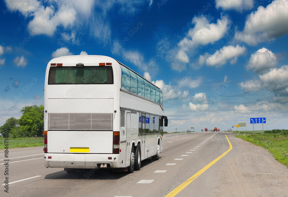 tourist bus on the asphalt road. Excursion with tourists Stock Photo ...