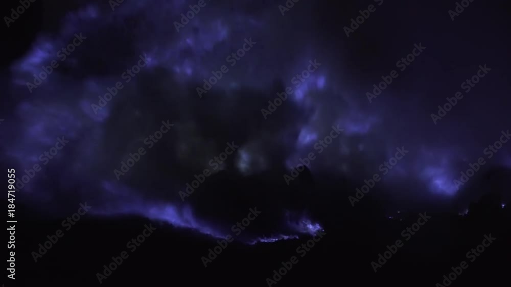 Blue fire of burning sulfur in a crater of a volcano Kawah ijen, Java ...