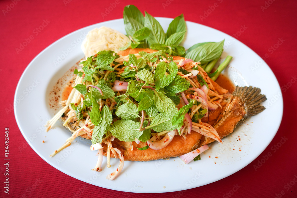 Deep fried Snake-head fish with Mixed Herb, Thai food - Pla Shon Lui ...