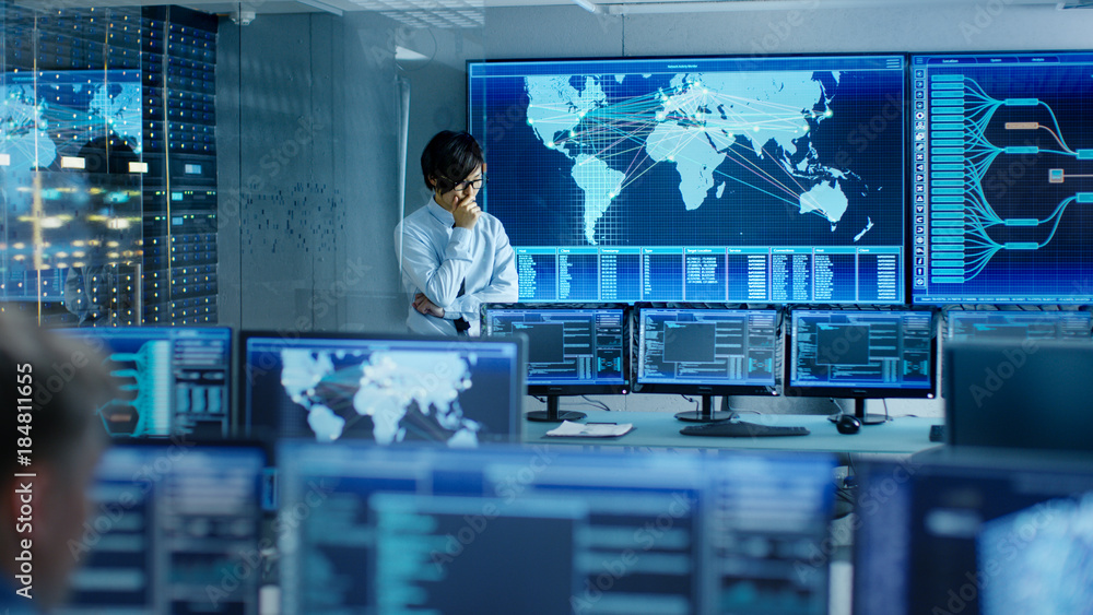 In the System Control Room Chief Engineer Thinks While Standing Before ...