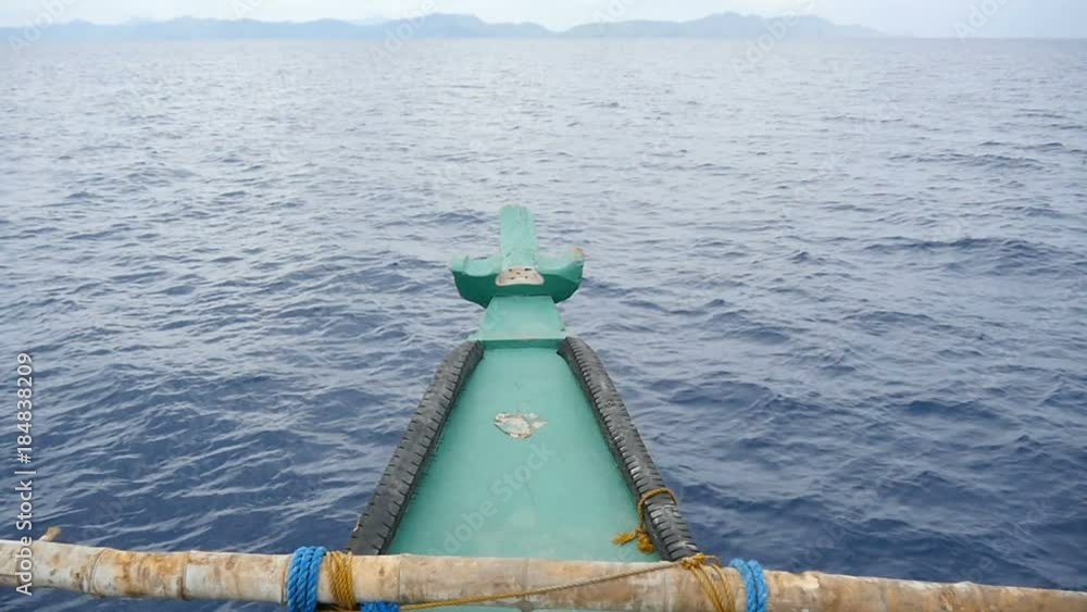 Traditional Philippine sailing ship bobbing gently above the waves ...