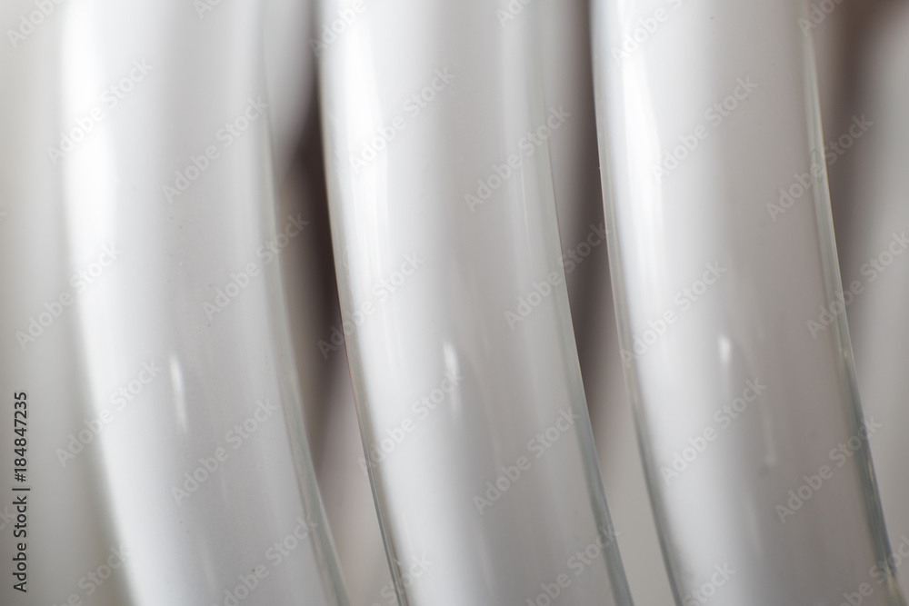 Compact fluorescent lamp. Close-up. Isolated on white with path ...