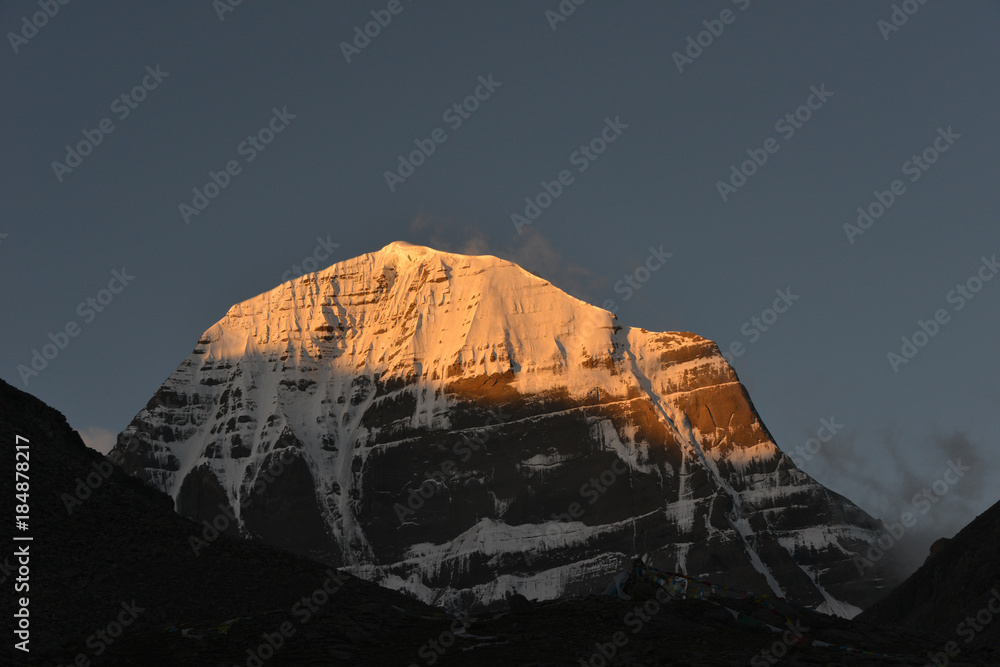 North Face of Mount Kailash with sun rays on the peak Stock Photo ...