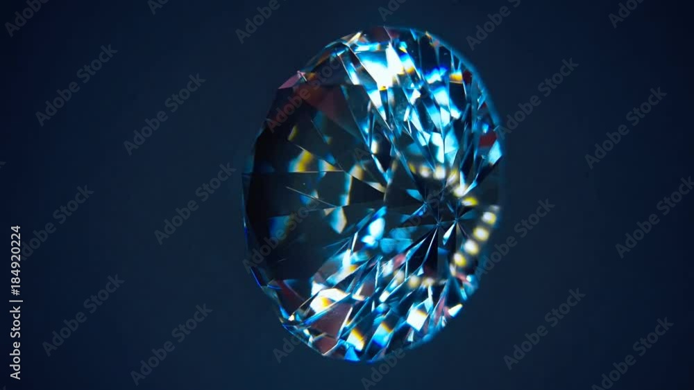 The diamond is rotation and shimmer all the colors of the rainbow when ...